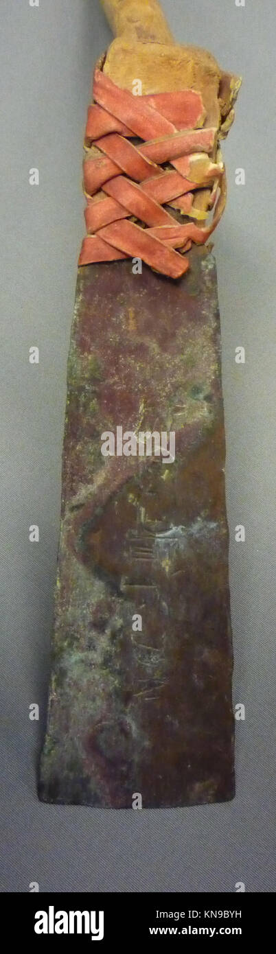 This adze, featuring an inscription, was used in ancient toolmaking ...