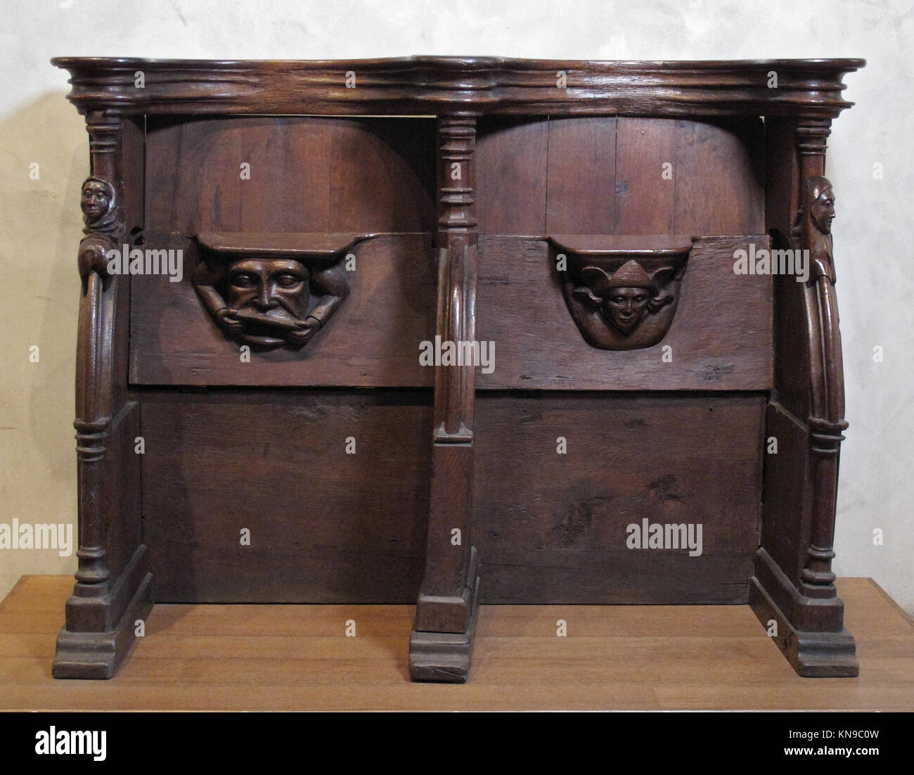 These choir stalls are part of a religious structure, featuring ...