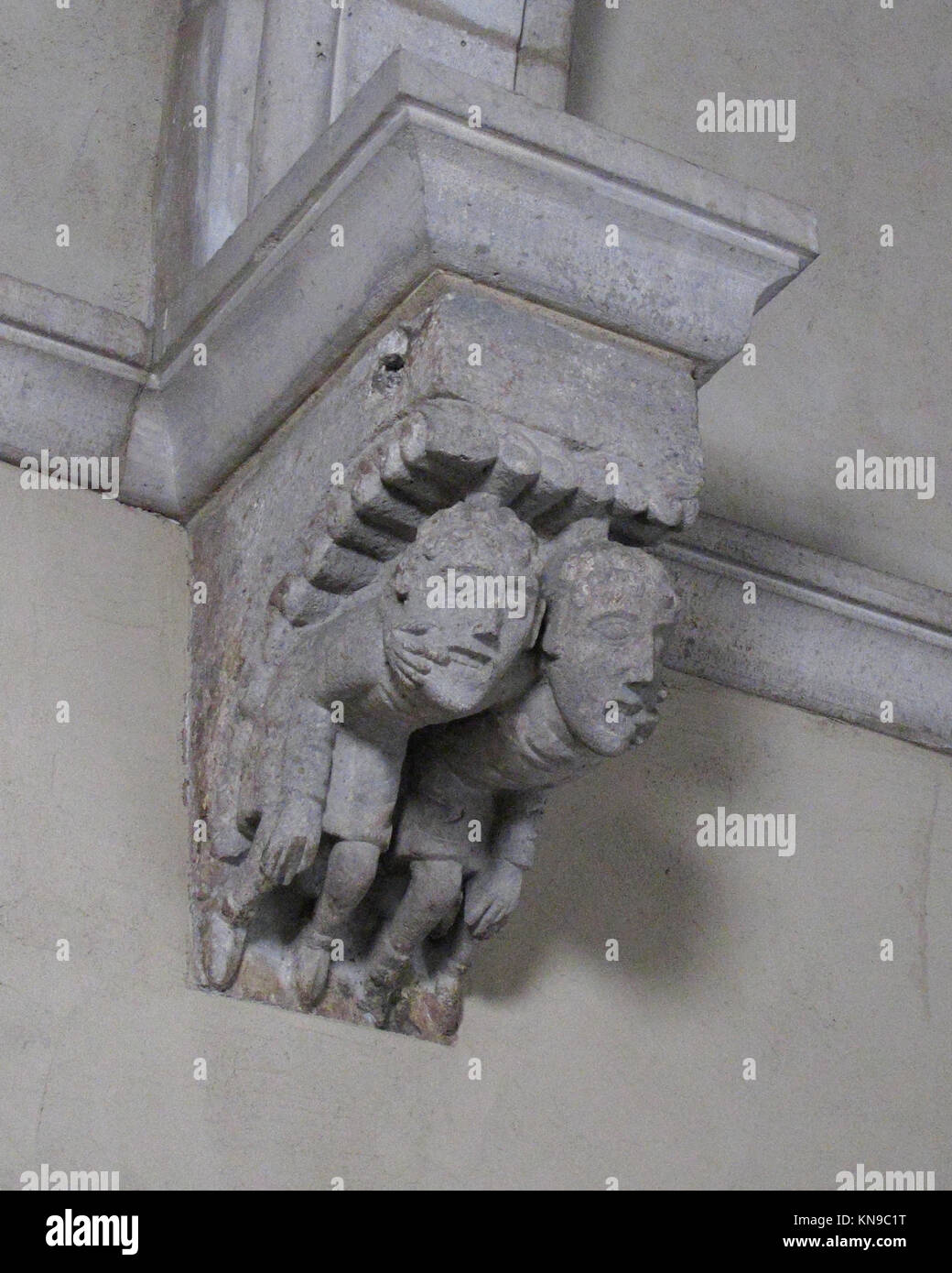 This corbel depicts two men with their fingers in their mouths, part of ...
