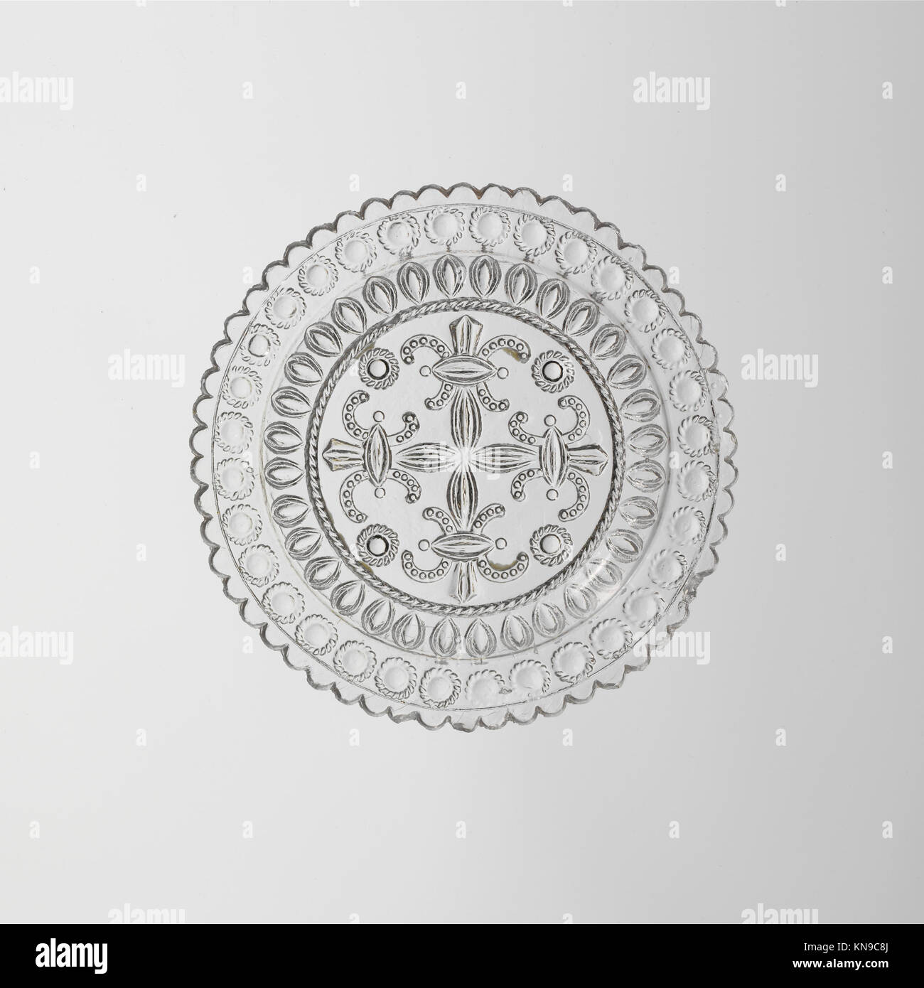 This lacy pressed glass cup plate, produced by Fort Pitt Glass Works ...