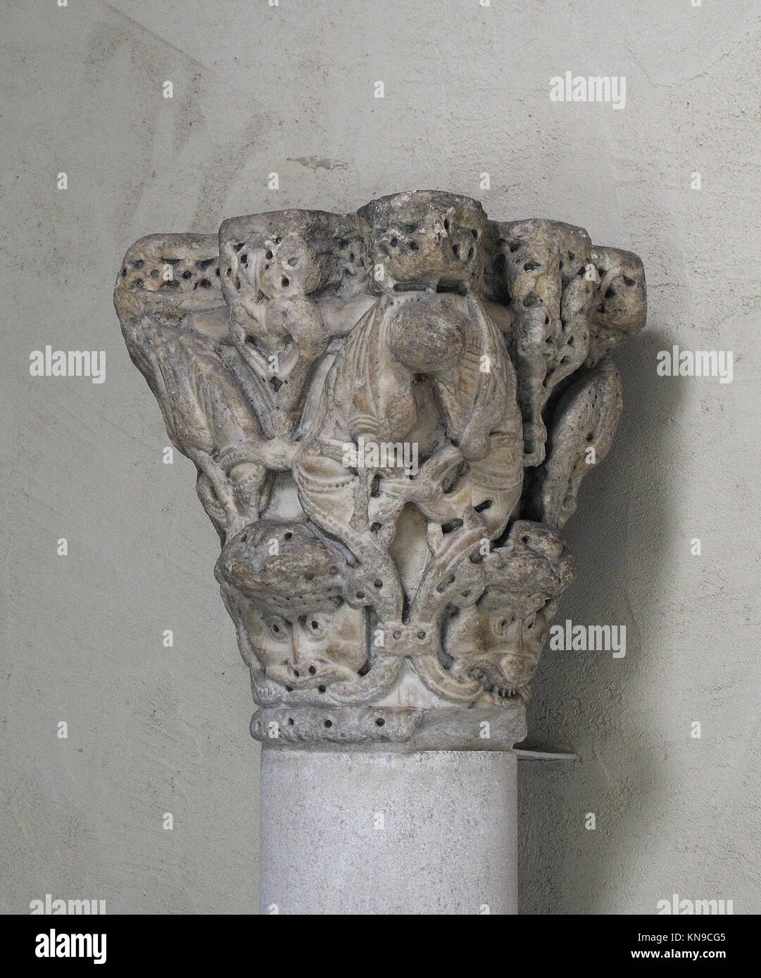 This capital, likely part of a larger architectural structure, reflects ...