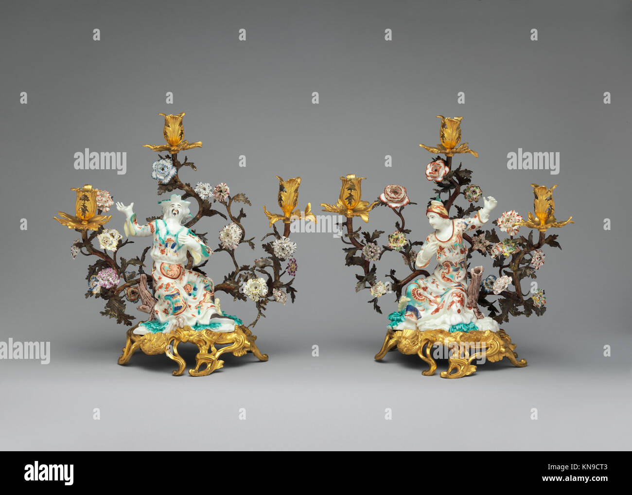 This figure, mounted as a candelabrum, serves both as an artistic ...