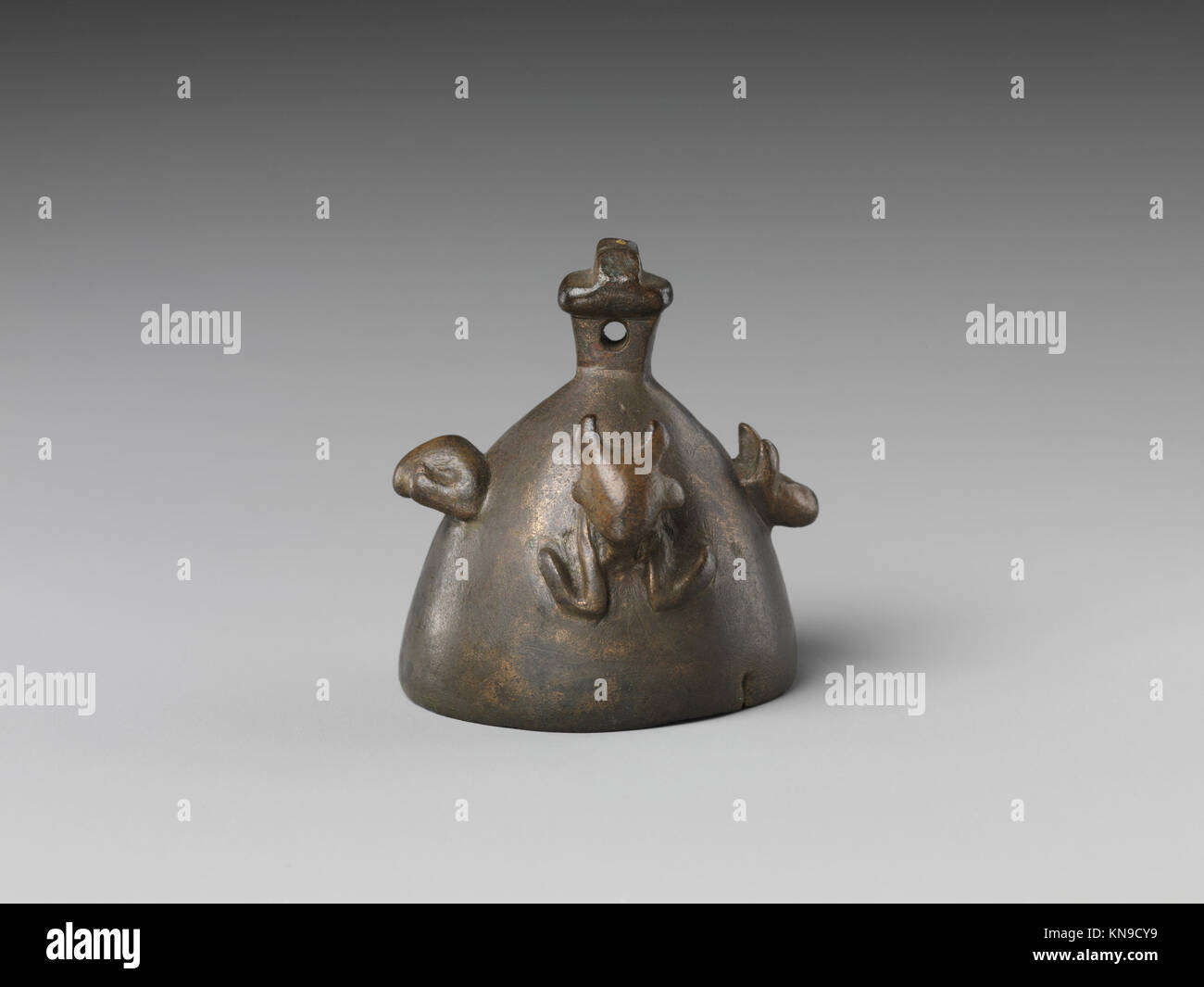 This bell, cataloged as MET DP239487, features heads of a ram, jackal ...