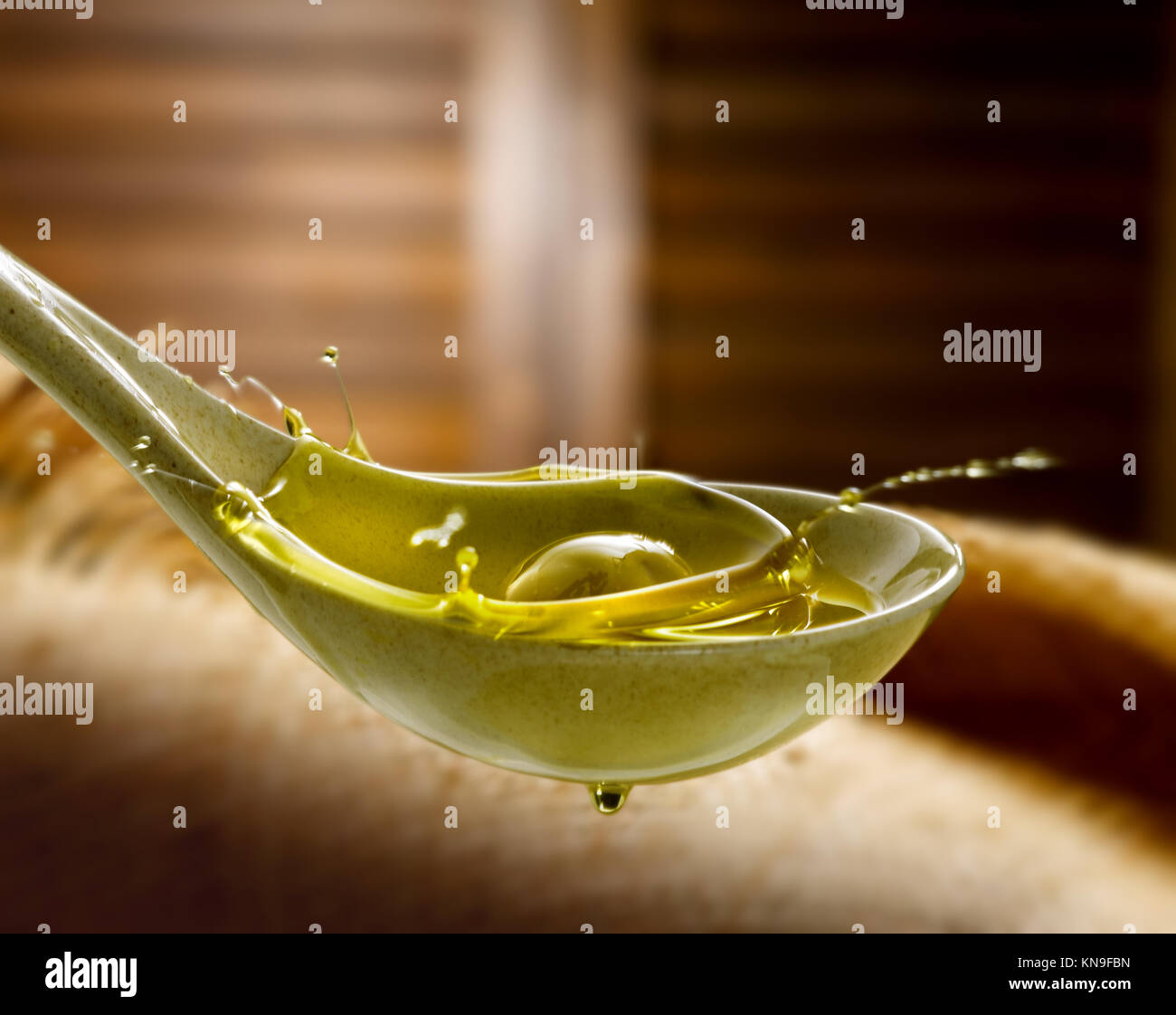 extra virgin olive oil poured Stock Photo - Alamy