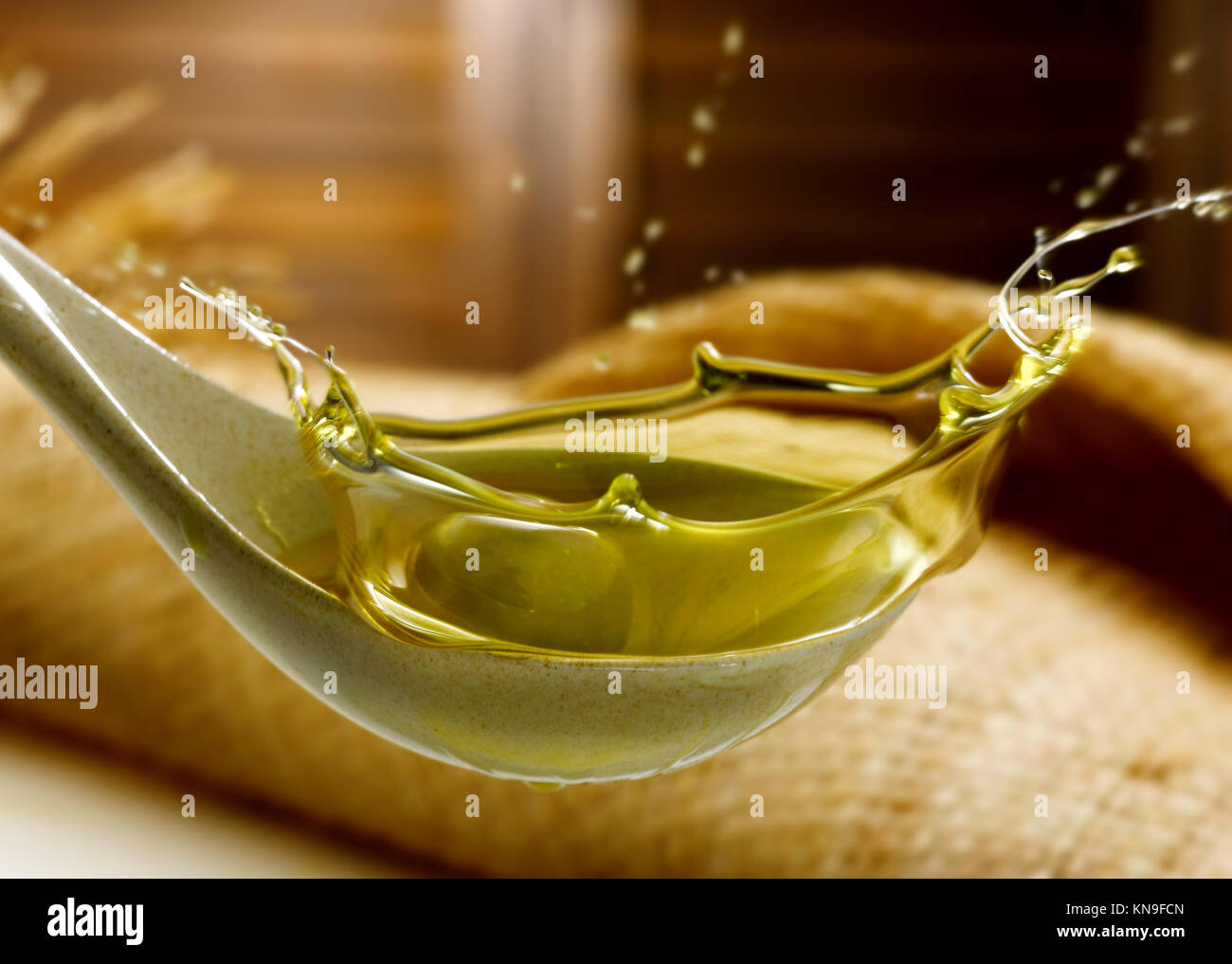 extra virgin olive oil poured Stock Photo - Alamy