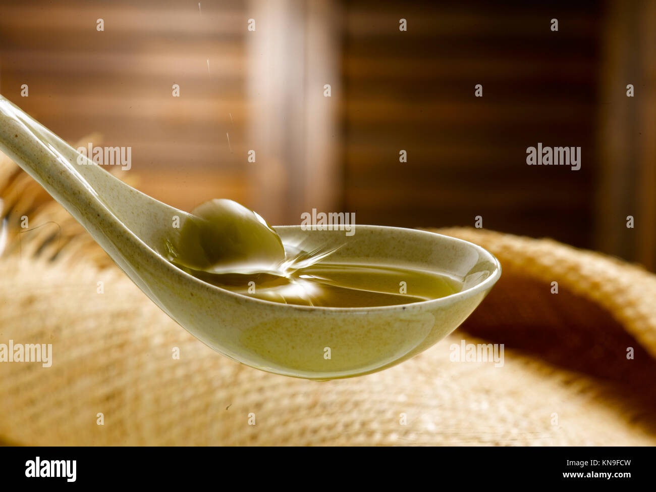 extra virgin olive oil poured Stock Photo - Alamy