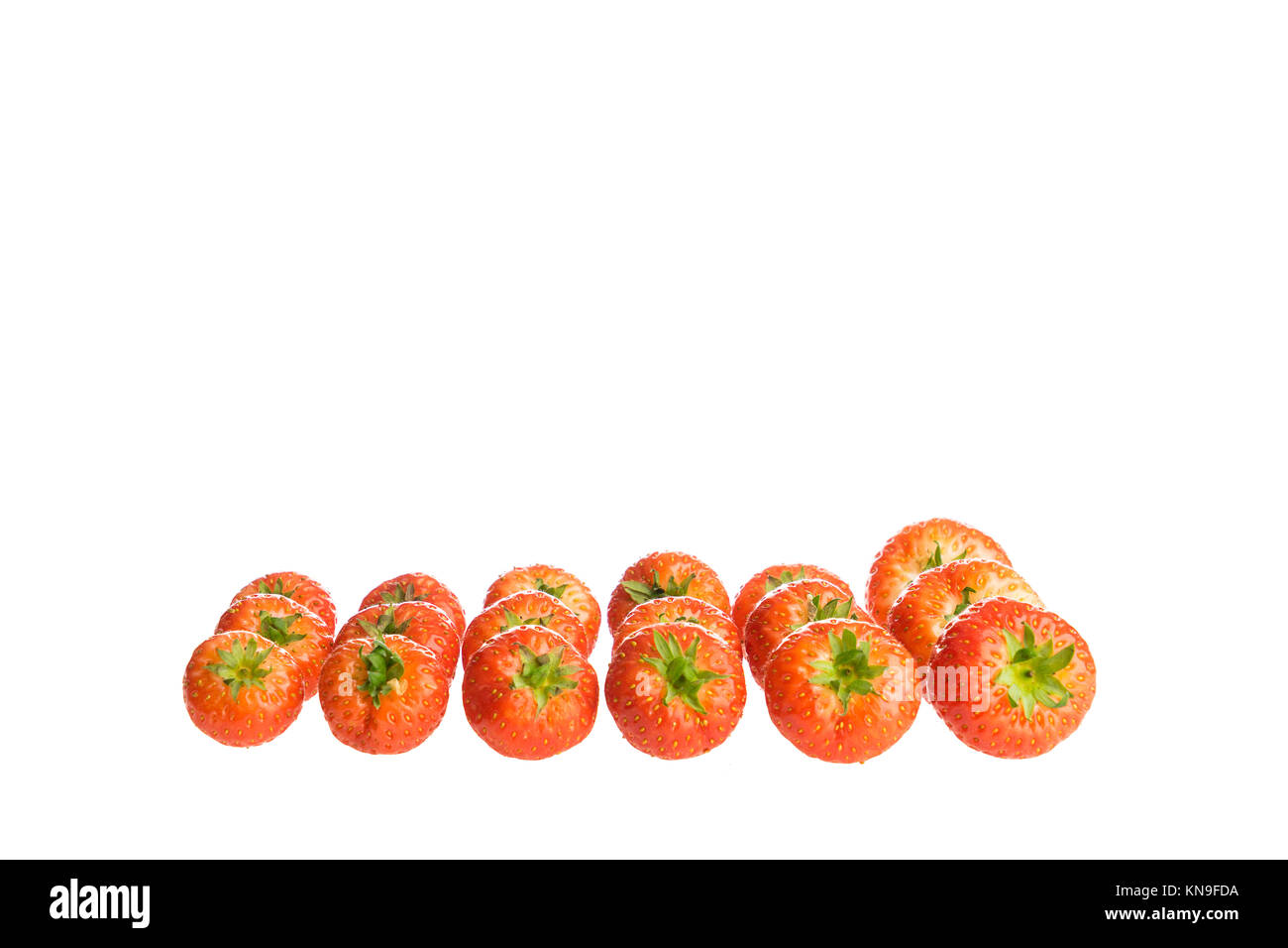 Fresh strawberries lying lined up isolated on a white background Stock ...