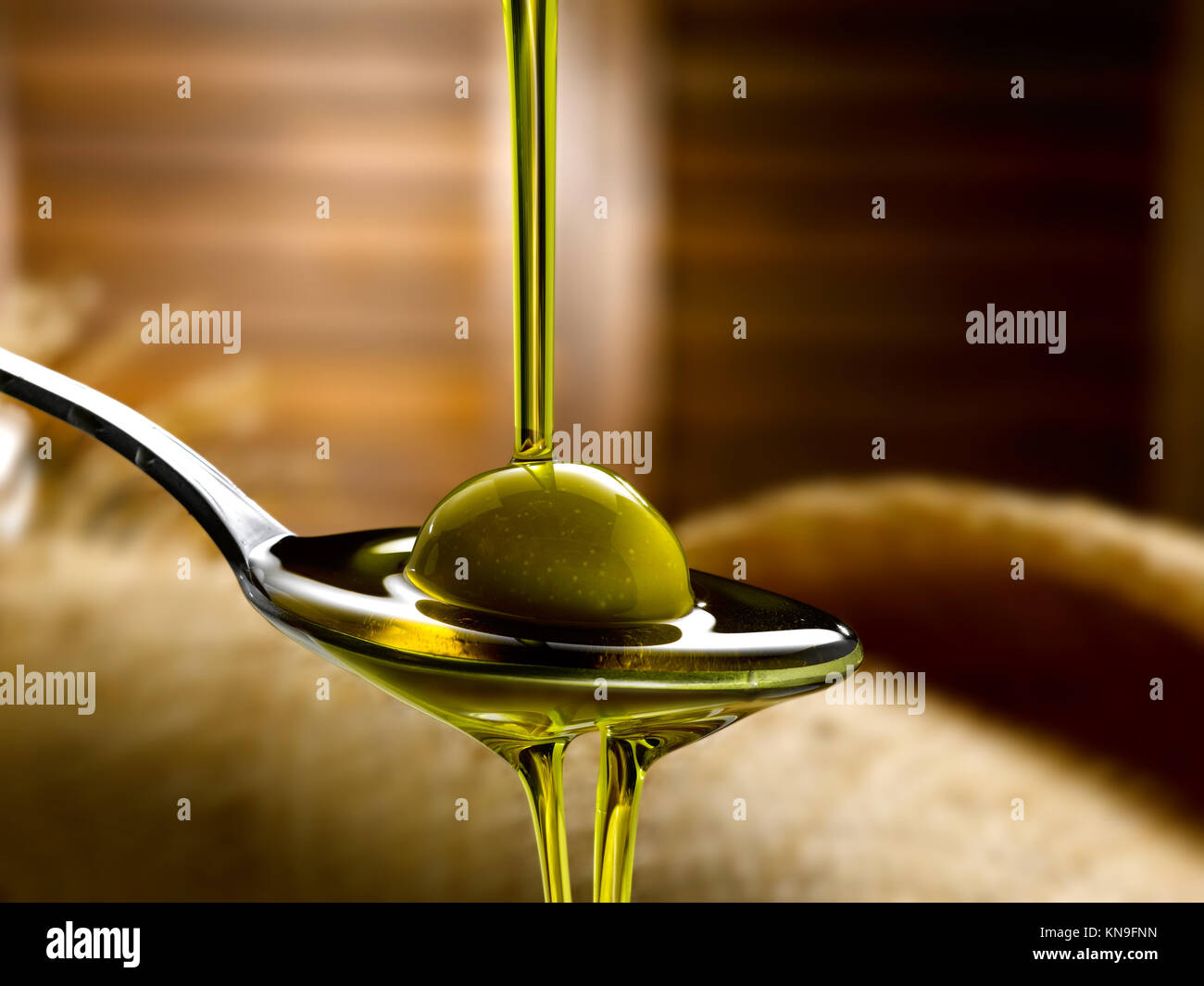 extra virgin olive oil poured Stock Photo - Alamy