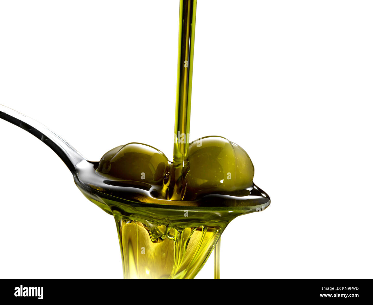 extra virgin olive oil poured Stock Photo - Alamy