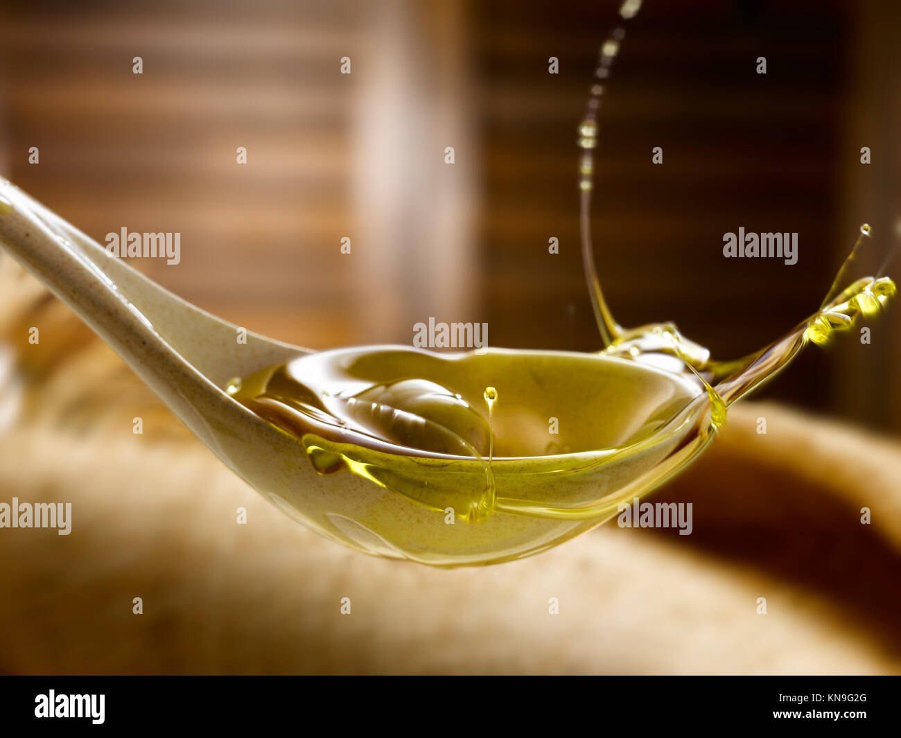 extra virgin olive oil poured Stock Photo - Alamy
