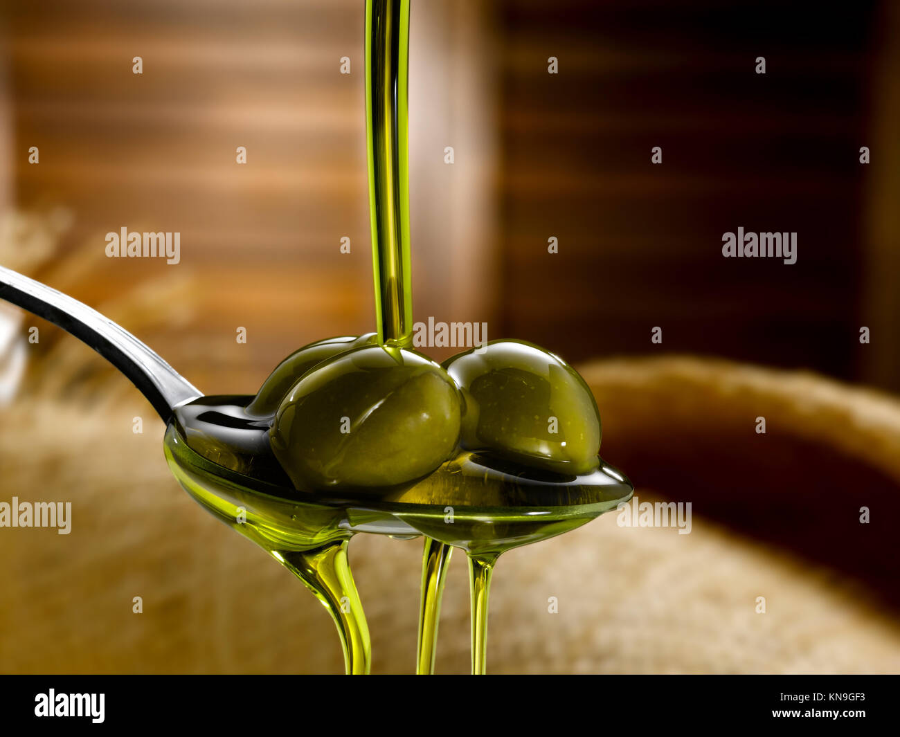 extra virgin olive oil poured Stock Photo - Alamy