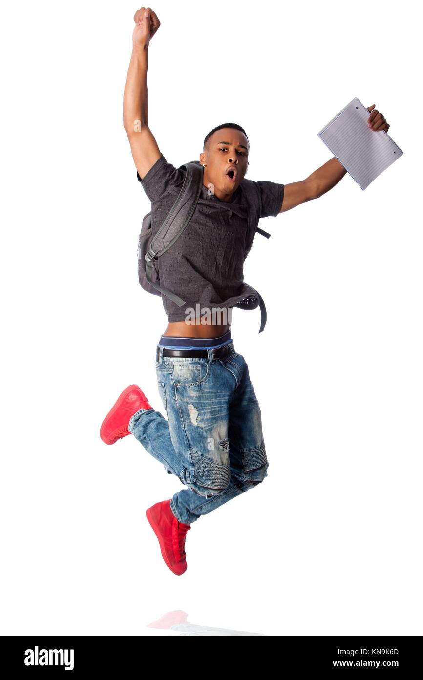 Handsome student jumping because of good grades, on white Stock Photo ...