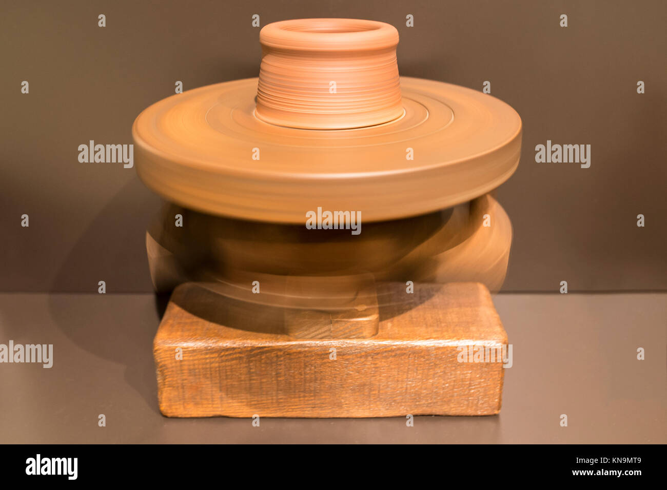 Reconstruction of primitive potter wheel in action. Brought by ...