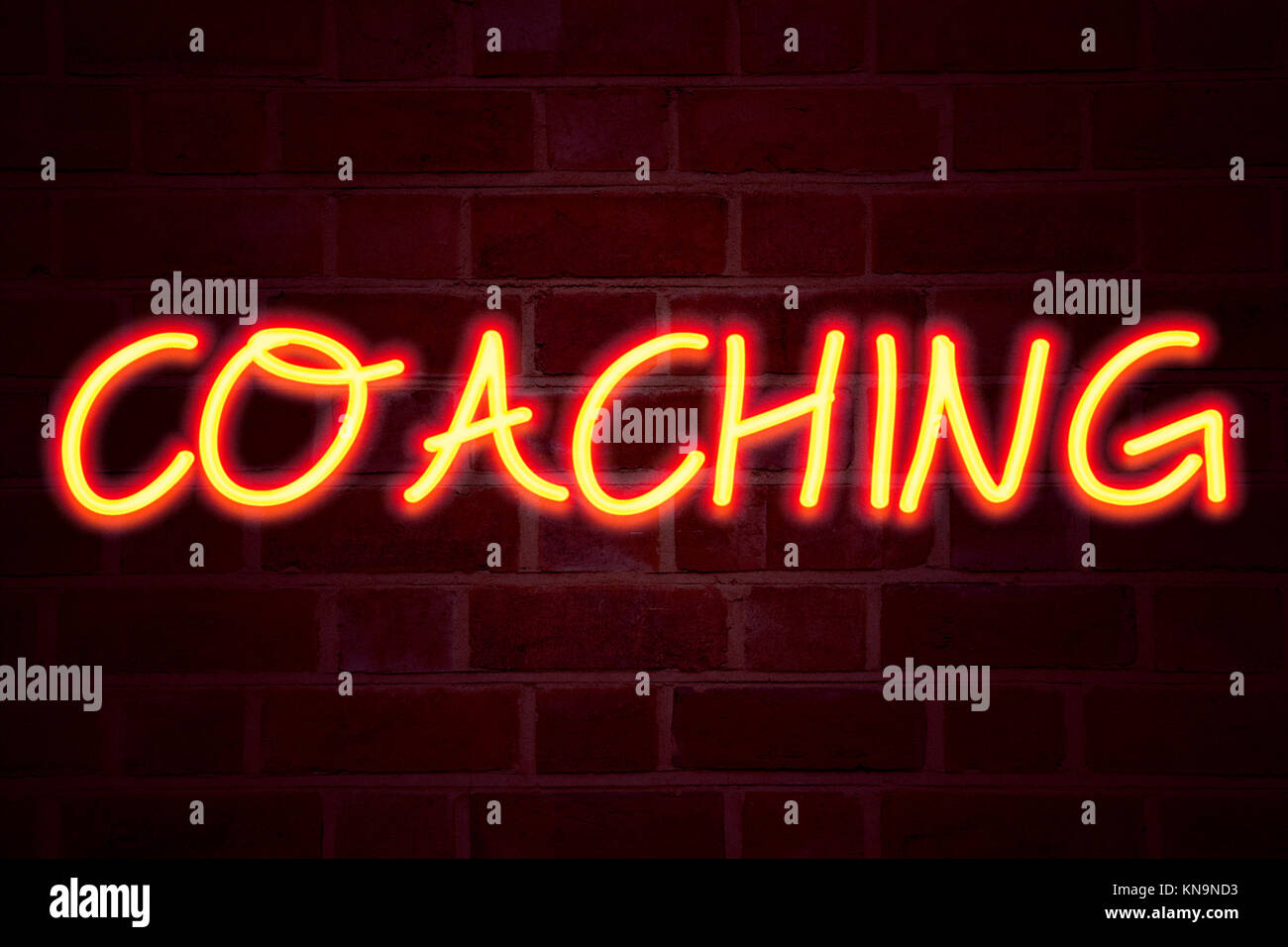 Coaching neon sign on brick wall background. Fluorescent Neon tube Sign ...