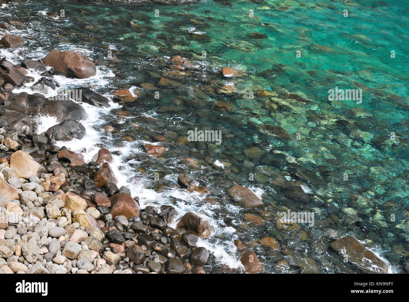 Clean, unpolluted shore covered with stones and pebbles. Symbolizes ...