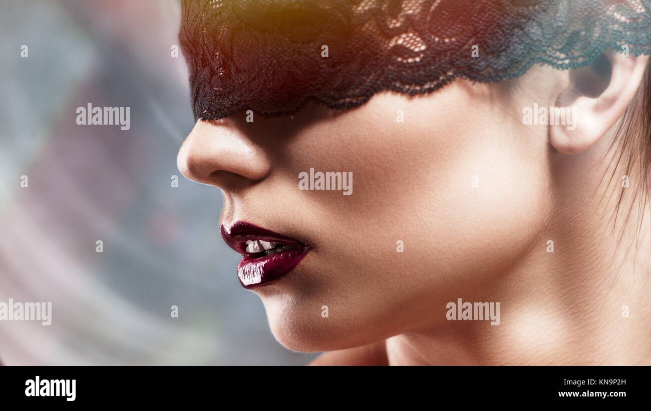 Secret, female portrait, face part with black mask Stock Photo - Alamy