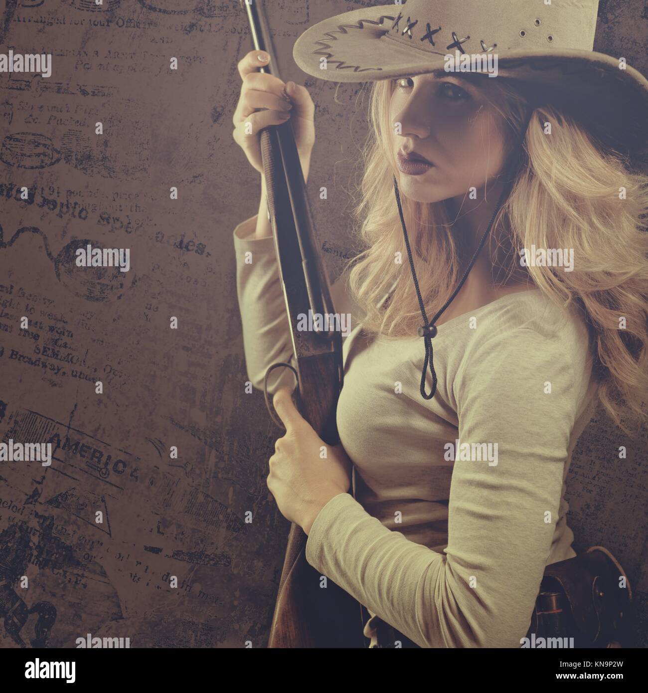 Wild West Female Portrait Of Cowgirl With Vintage Hunting Rifle Stock