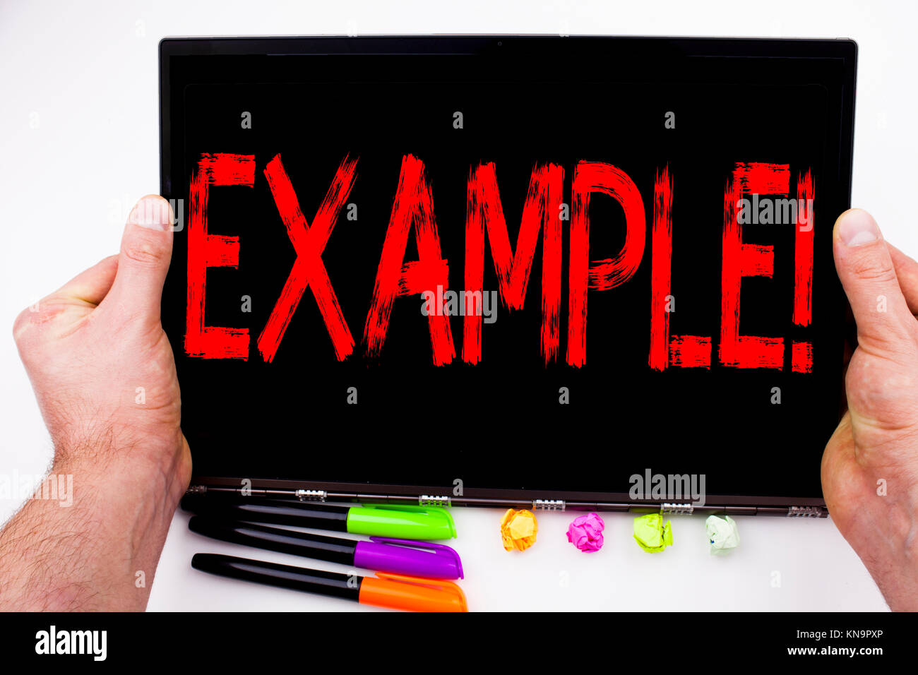 Example text written on tablet, computer in the office with marker, pen ...