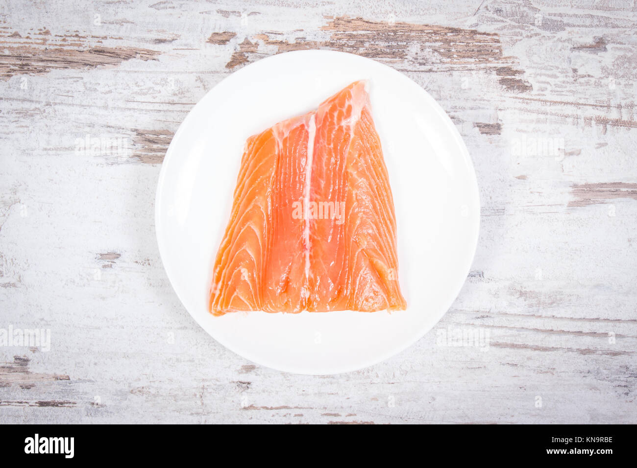 Fresh healthy salmon fish on white plate, concept of food containing ...