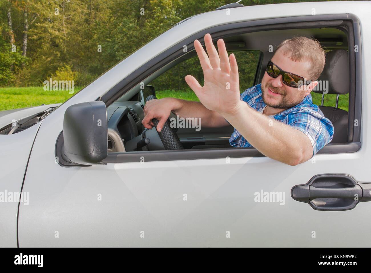 Man raising hand hi-res stock photography and images - Alamy
