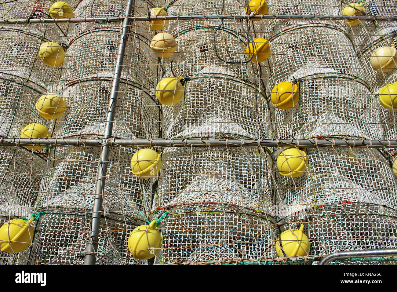 Cages to catch seafood stacked in the port of Santa Pola, Alicante ...