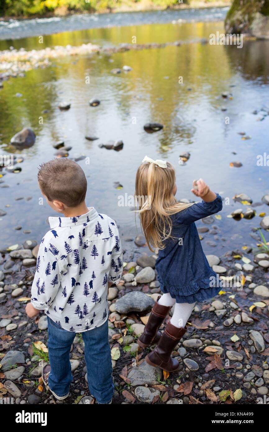 Kid throwing rocks hi-res stock photography and images - Alamy