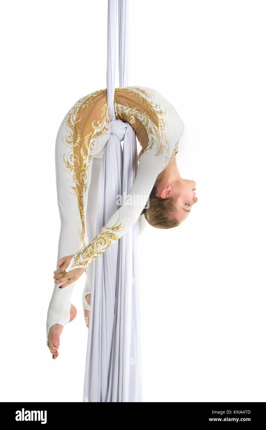 Pretty woman - aerialist performing aerial tricks on aerial silks ...