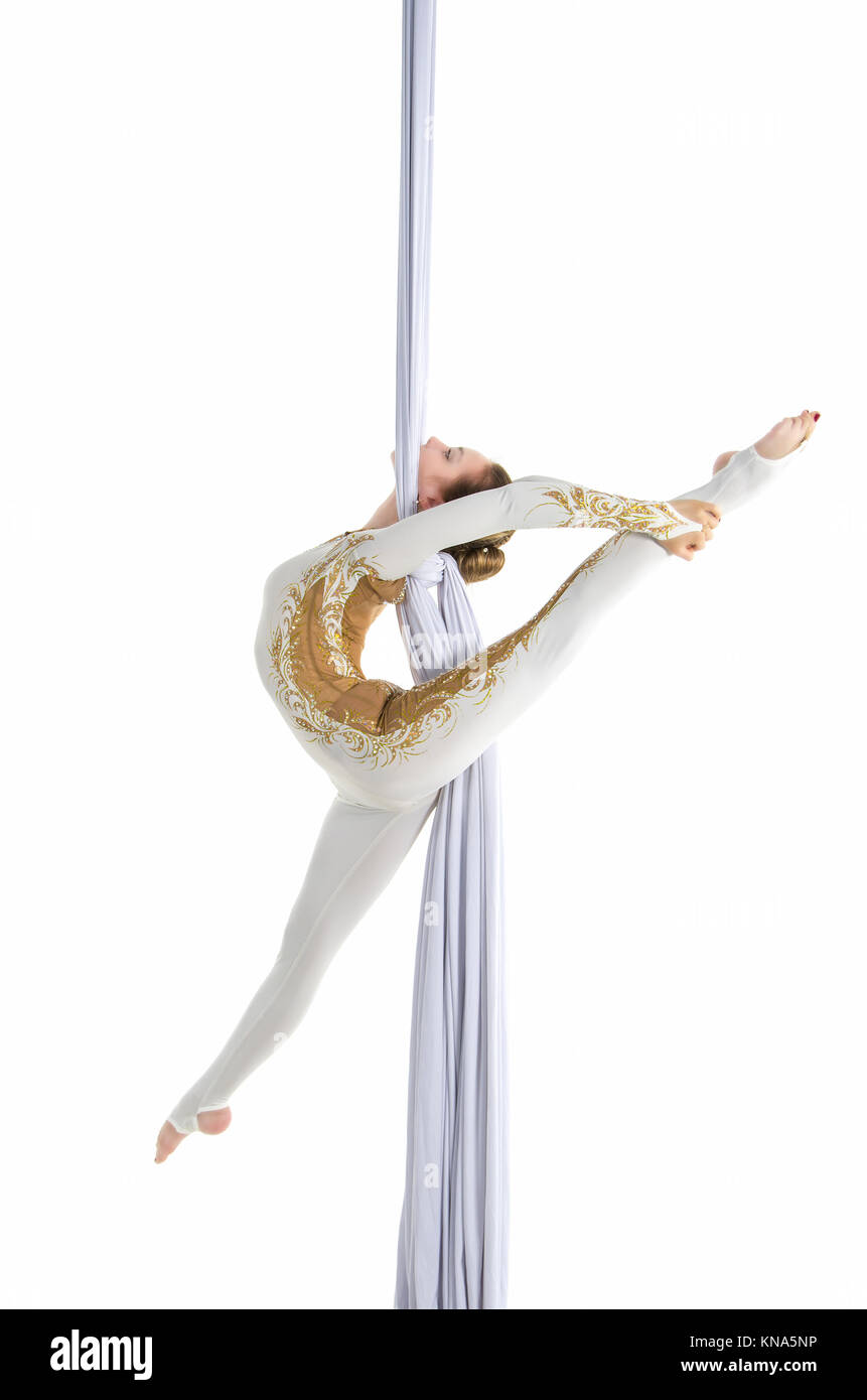 Pretty woman - aerialist performing aerial tricks on aerial silks ...