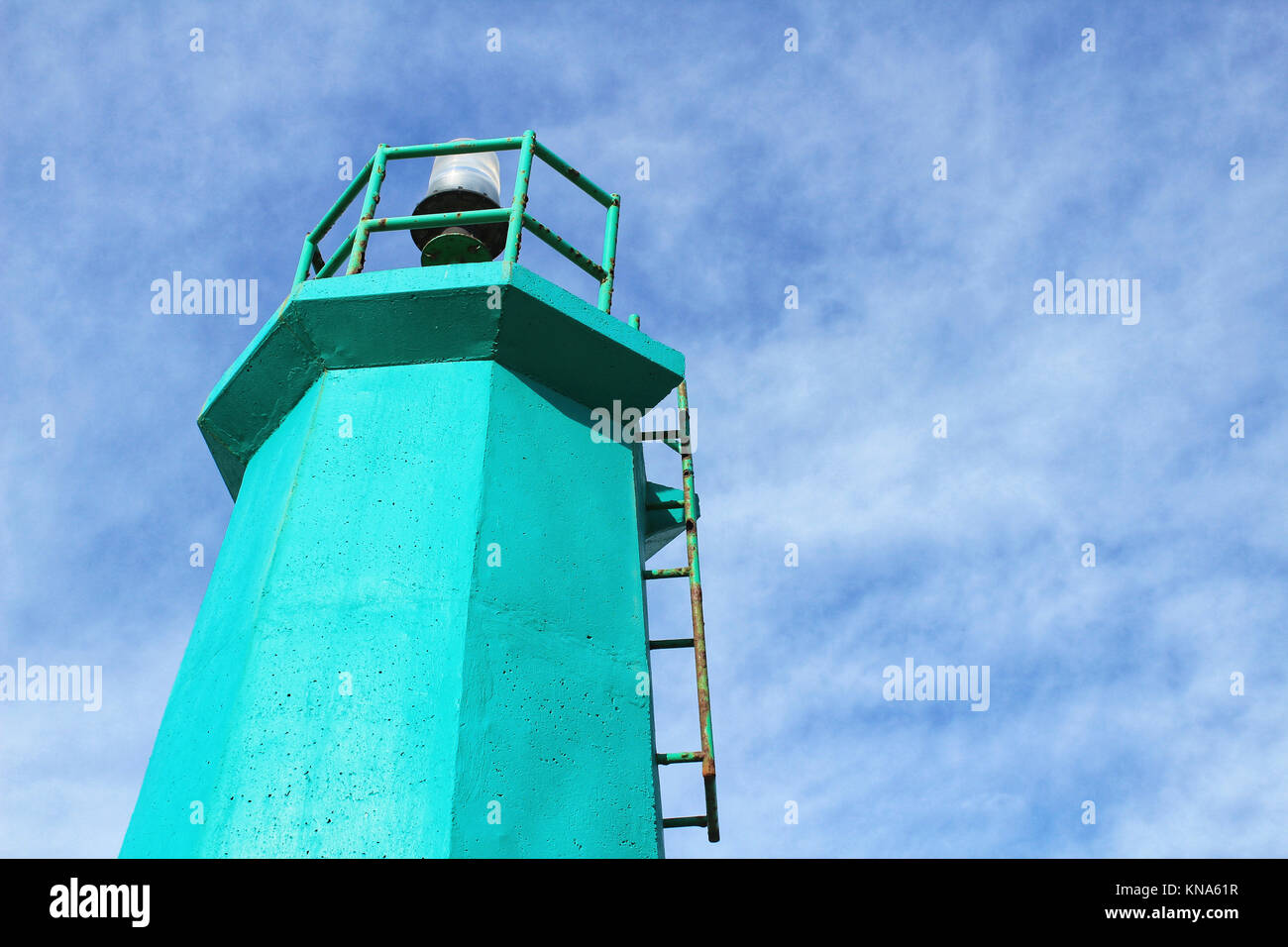 Colorful lighthouse in the dock in southern Spain Stock Photo - Alamy