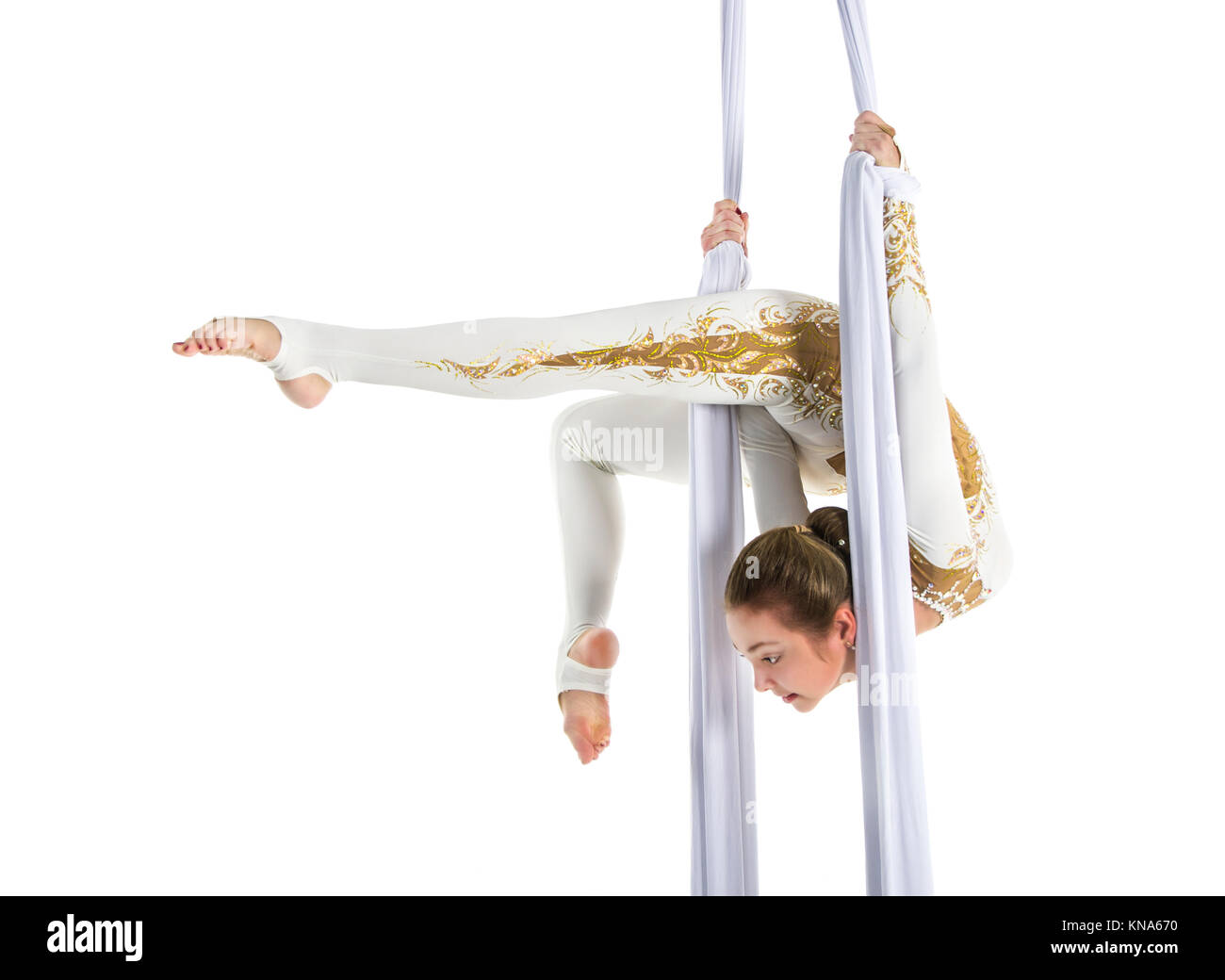 Pretty woman - aerialist performing aerial tricks on aerial silks ...
