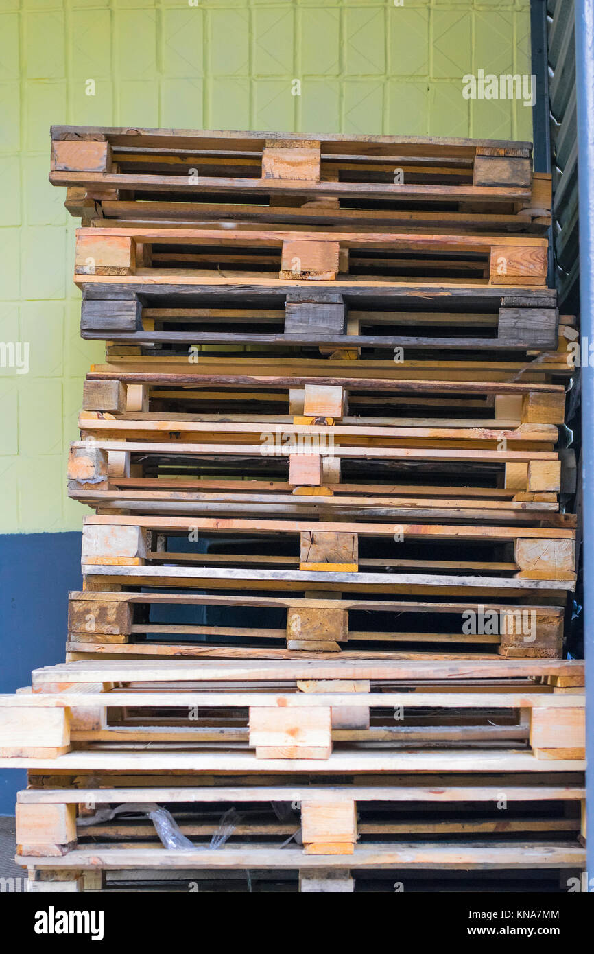 Old wooden pallets in the supermarket warehouse. Texture of pallets ...