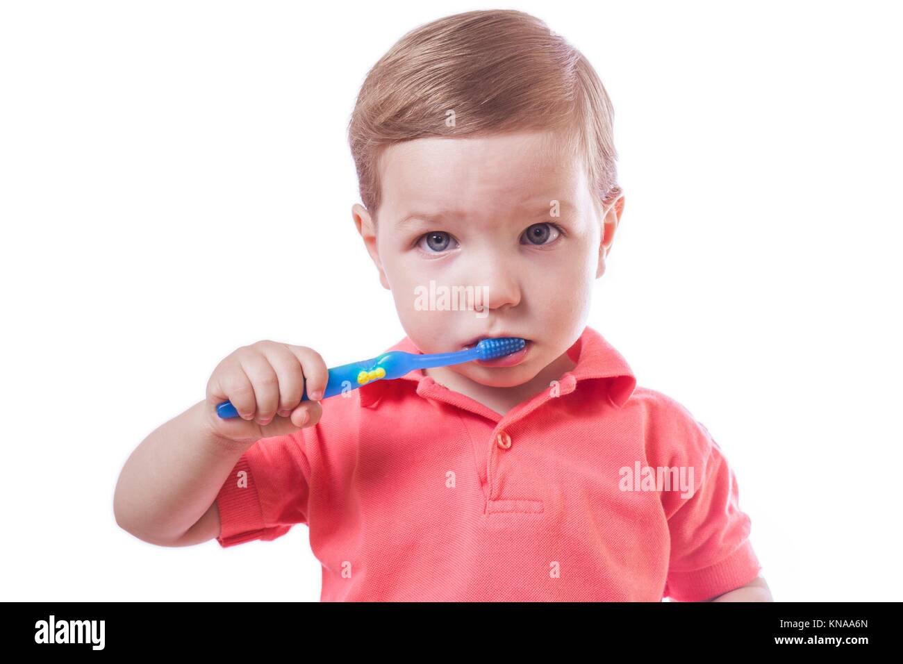 Cute baby boy brushing teeth. Isolated over white background Stock ...