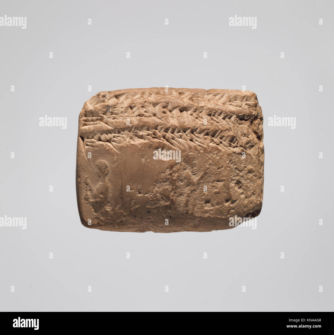 This cuneiform tablet from the Ebabbar archive includes an impressed ...
