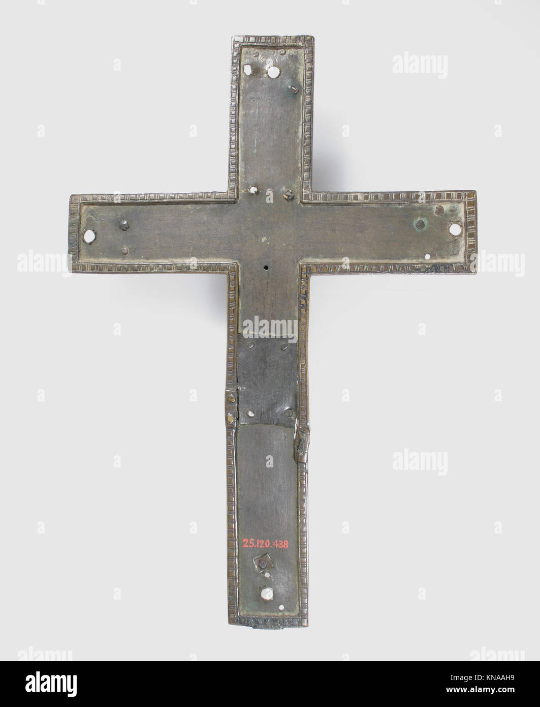 This crucifix represents Christian religious symbolism, showcasing ...