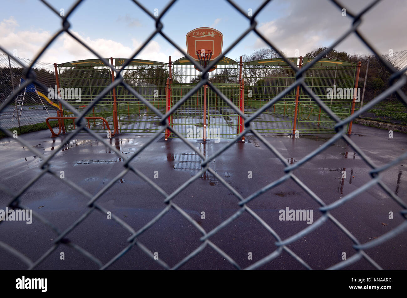 Rundown sports ground on a wet day Stock Photo - Alamy