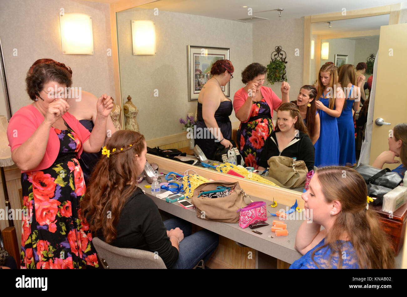 Bride and her wedding party getting prepared for her wedding Stock ...