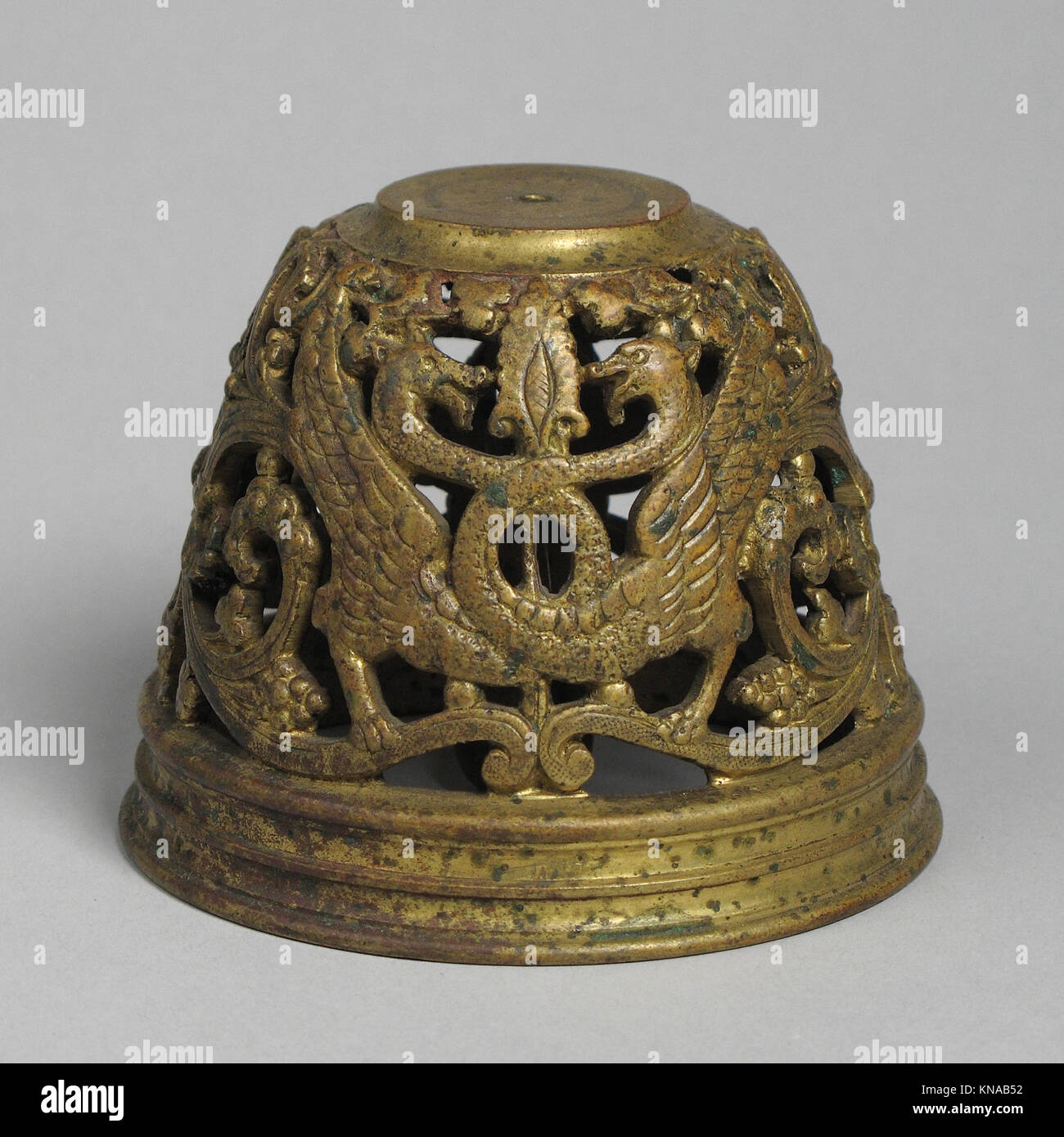 This ancient bell, dating from the early medieval period, is crafted ...