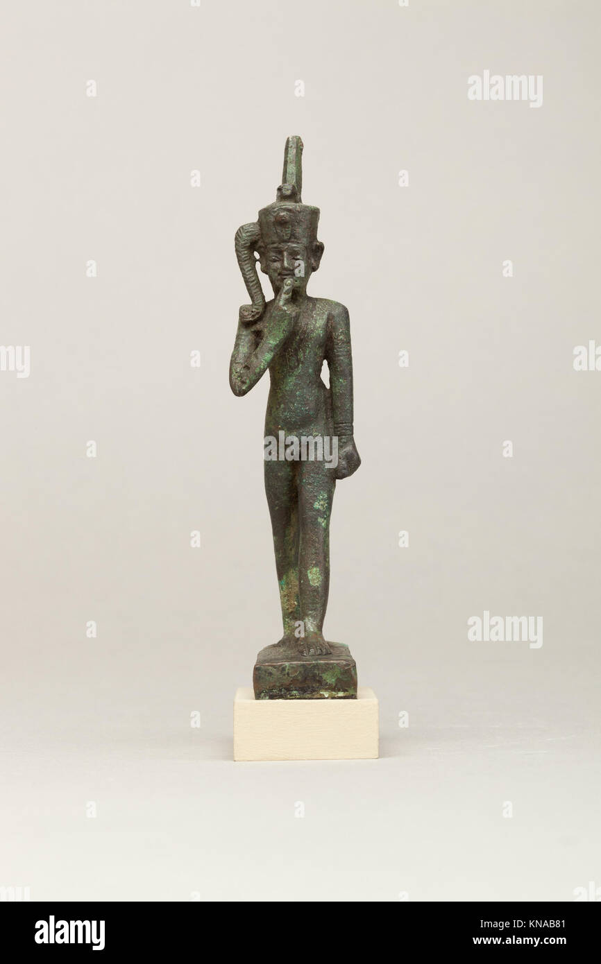 This figure of Harpokrates wearing a red crown represents the Egyptian ...