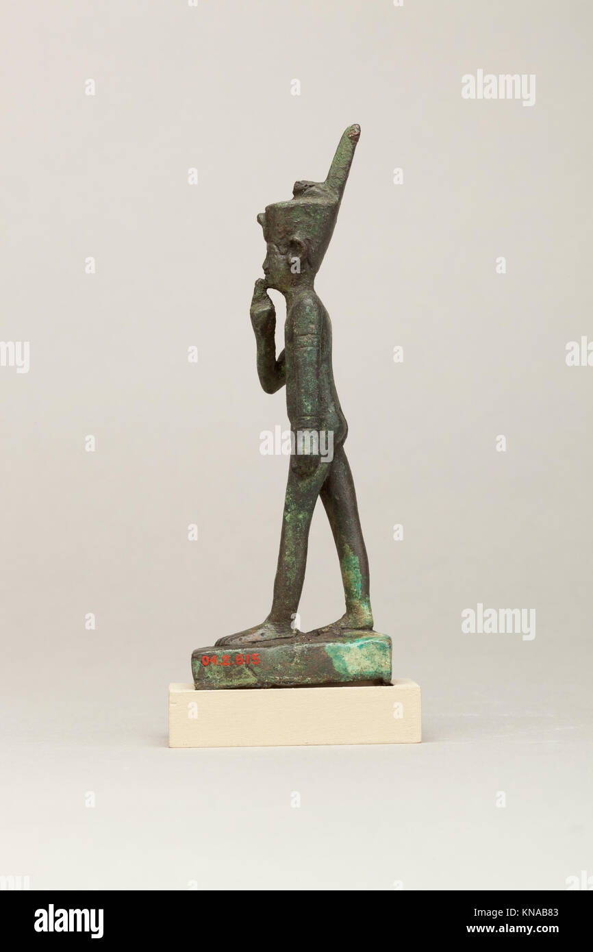 This figure of Harpokrates, depicted with a red crown, represents the ...