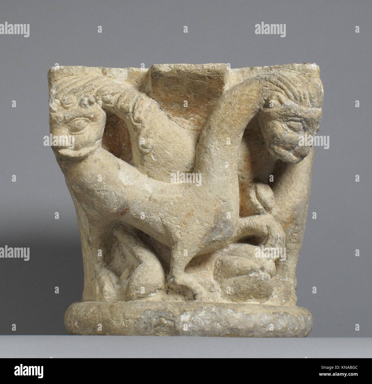 This capital features intertwined animal motifs, showcasing the ...