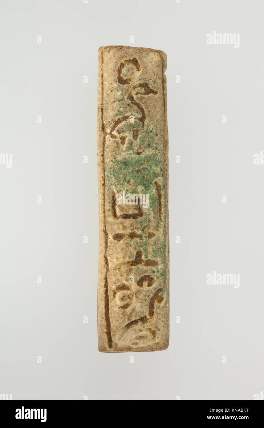 This cylinder bead, inscribed with the name Amenhotep, is an Egyptian ...