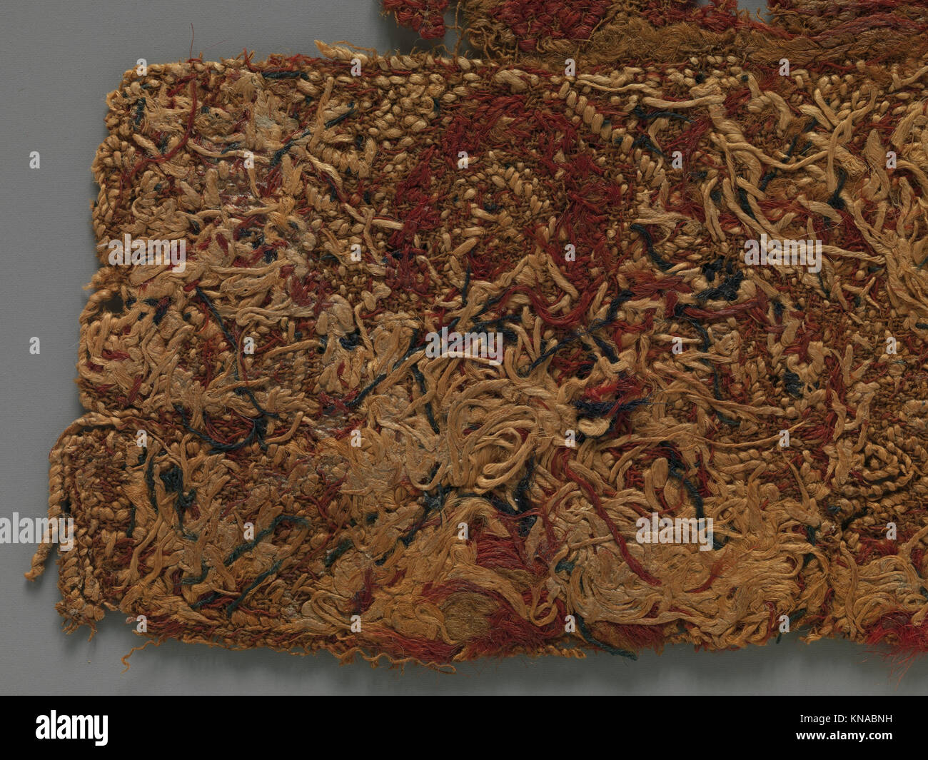 This fragment is a piece of an ancient or historical object. It ...