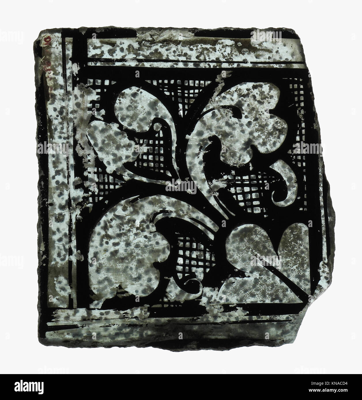 This medieval glass fragment shows intricate design and craftsmanship ...