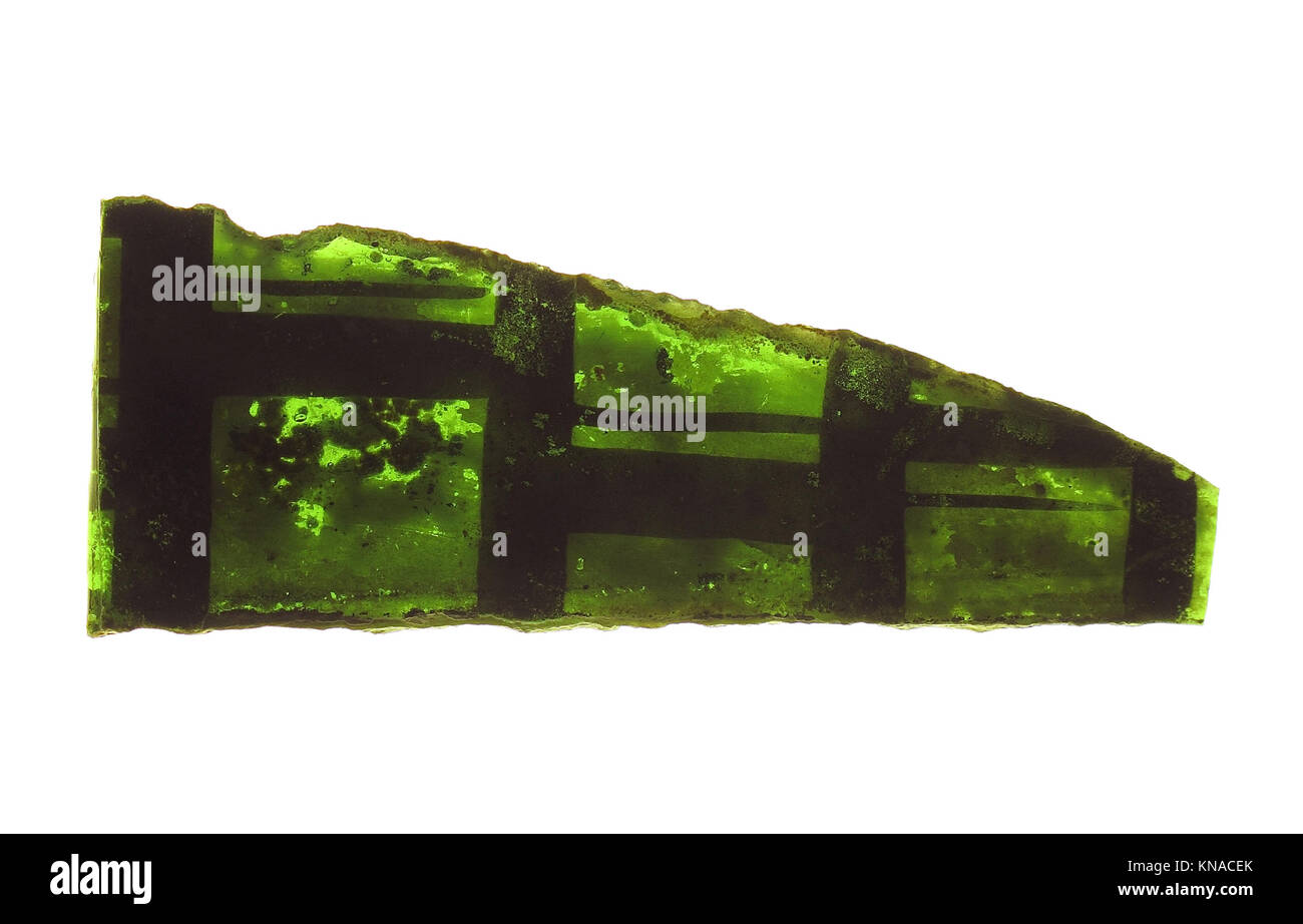 This glass fragment reflects ancient glassmaking techniques and ...