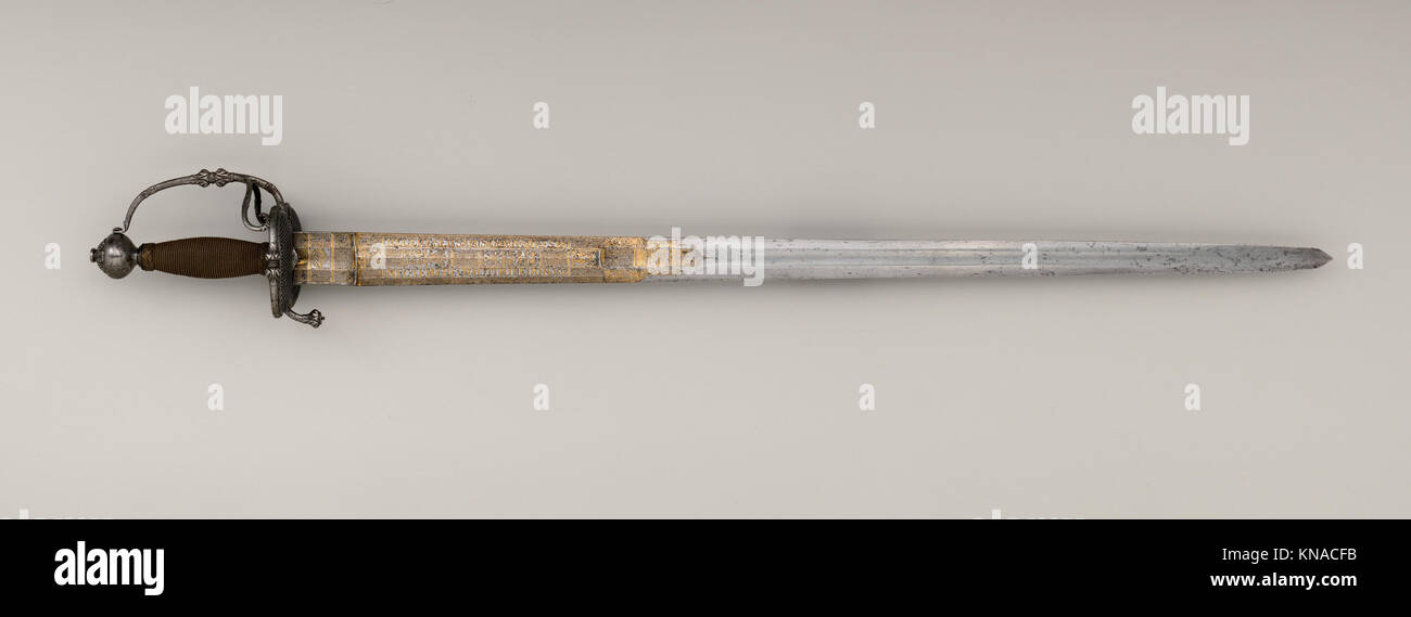 This broadsword features a finely crafted blade and hilt, reflecting ...