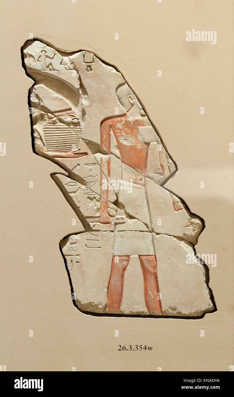 This figure of a scribe is a finely detailed sculpture representing a ...