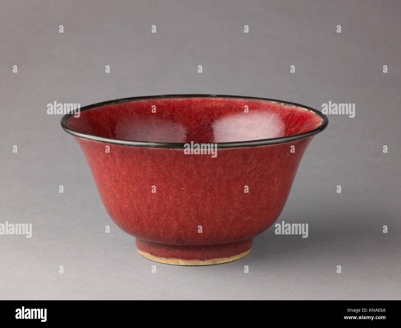 Chinese 18th-century porcelain bowl with a mottled deep red Sang de ...