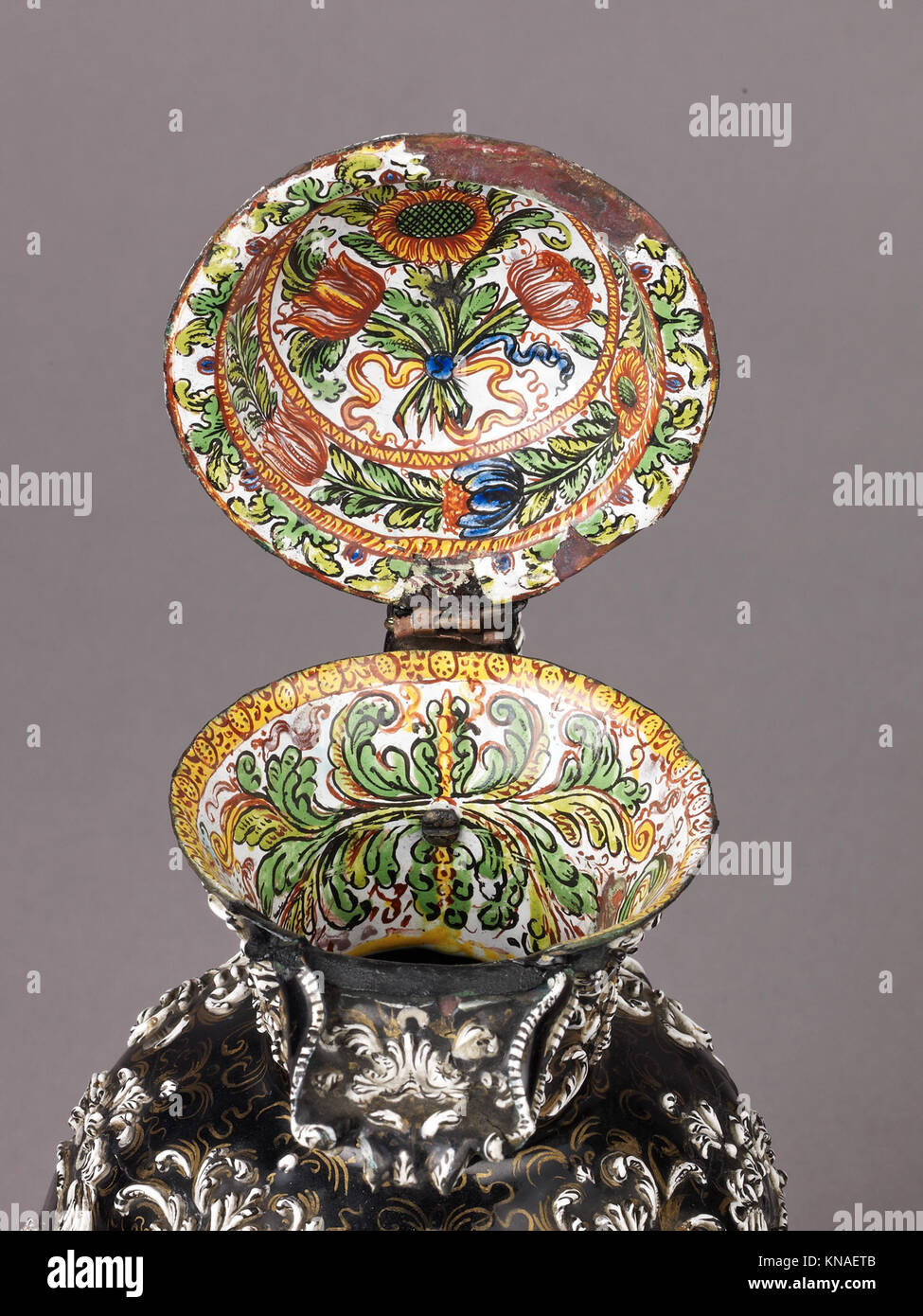 This ewer is a decorative and functional vessel, used for holding ...