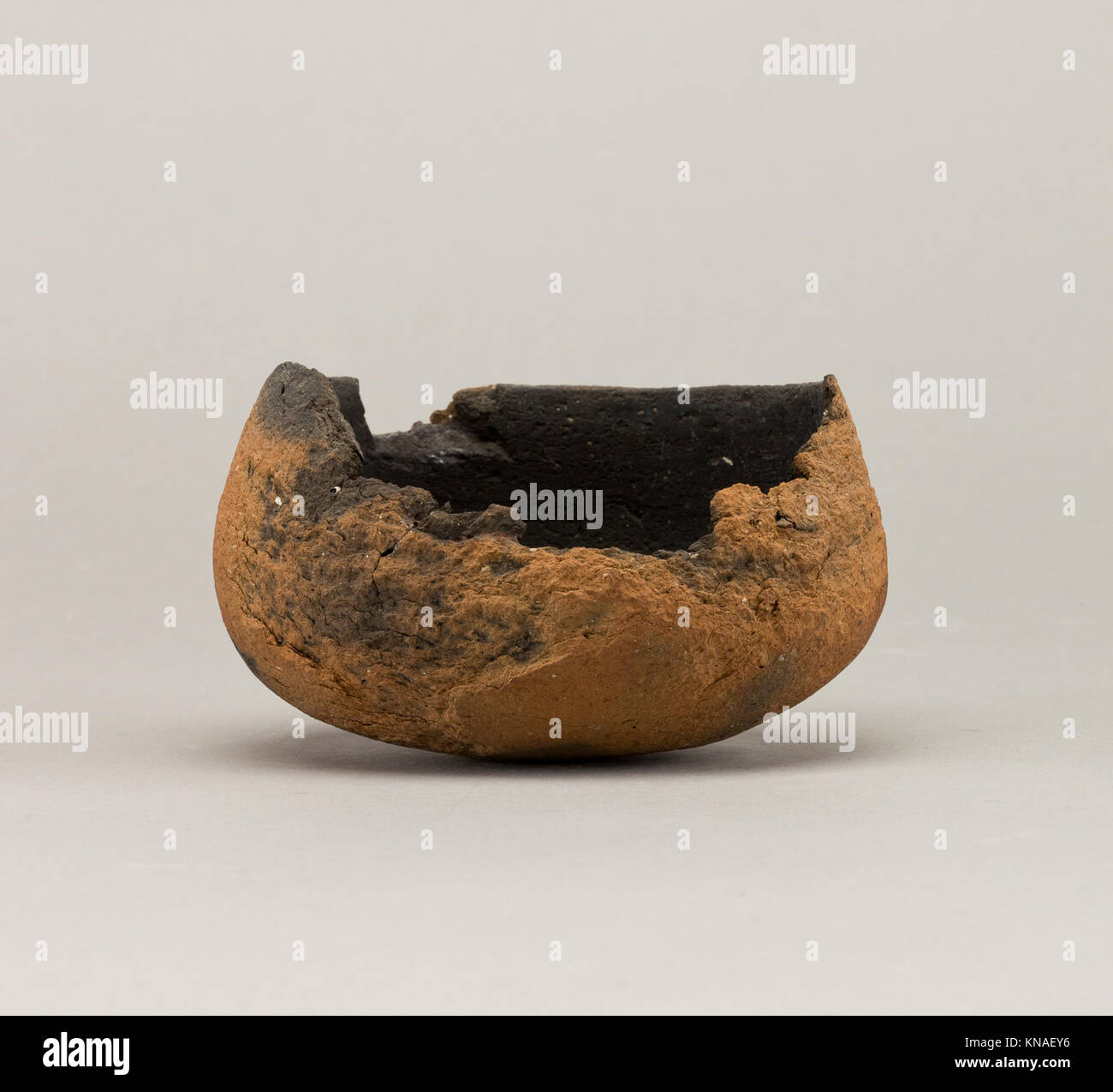 This ceramic deep bowl demonstrates utilitarian and artistic features ...