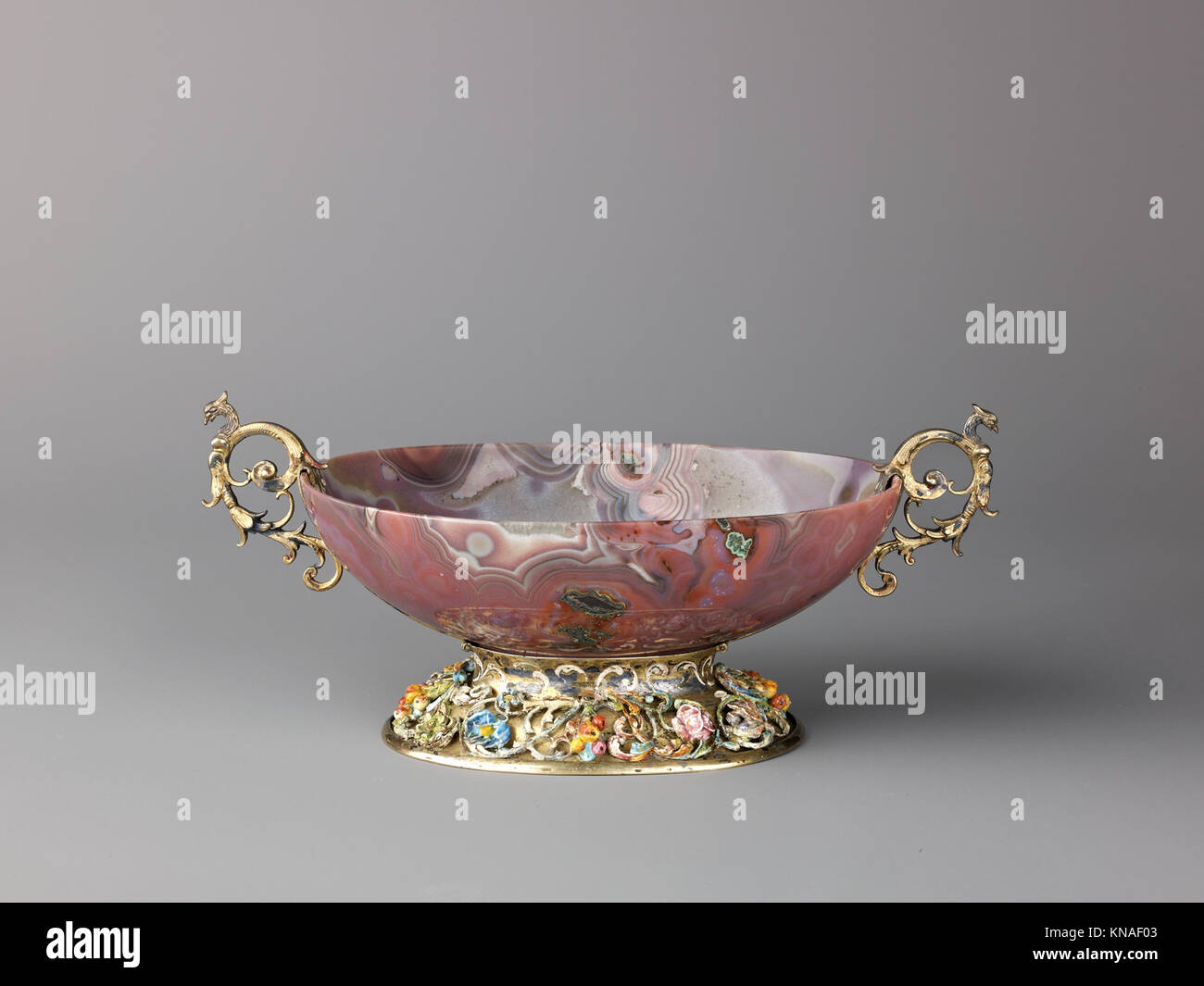 This bowl, with its functional handles, demonstrates the period's ...